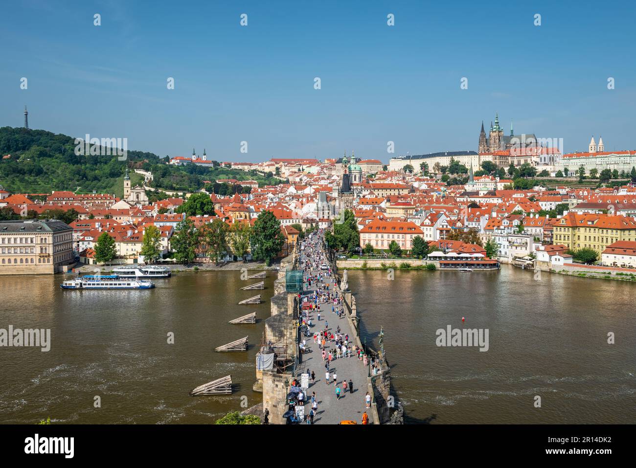 PRAGUE, CZECH REPUBLIC - AUGUST 25, 2022: Aerial panorama view of the famous Charles bridge in ...