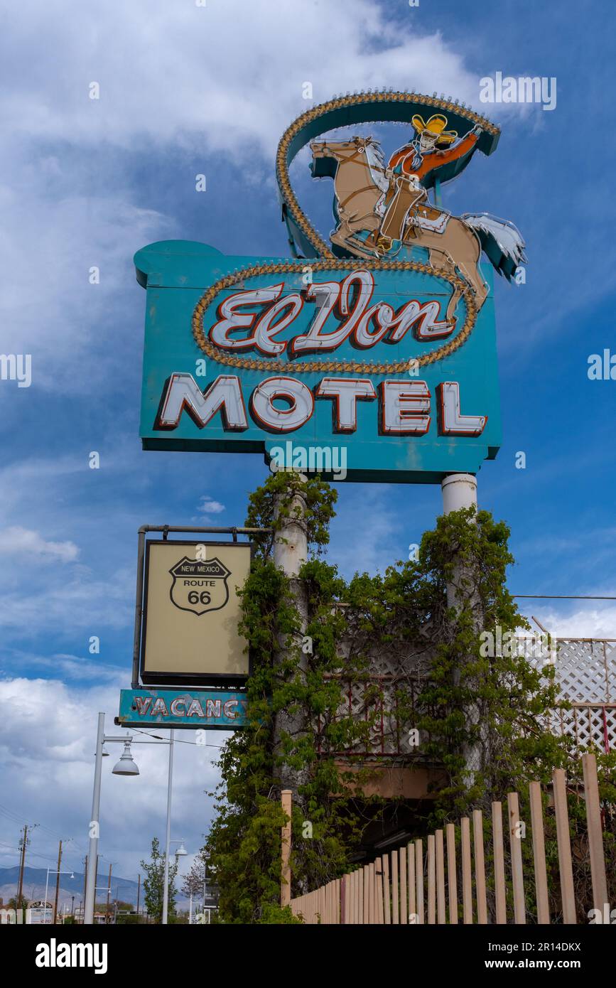 Neon sign for El Don Motel with a cowboy riding a horse, a lasso in his ...