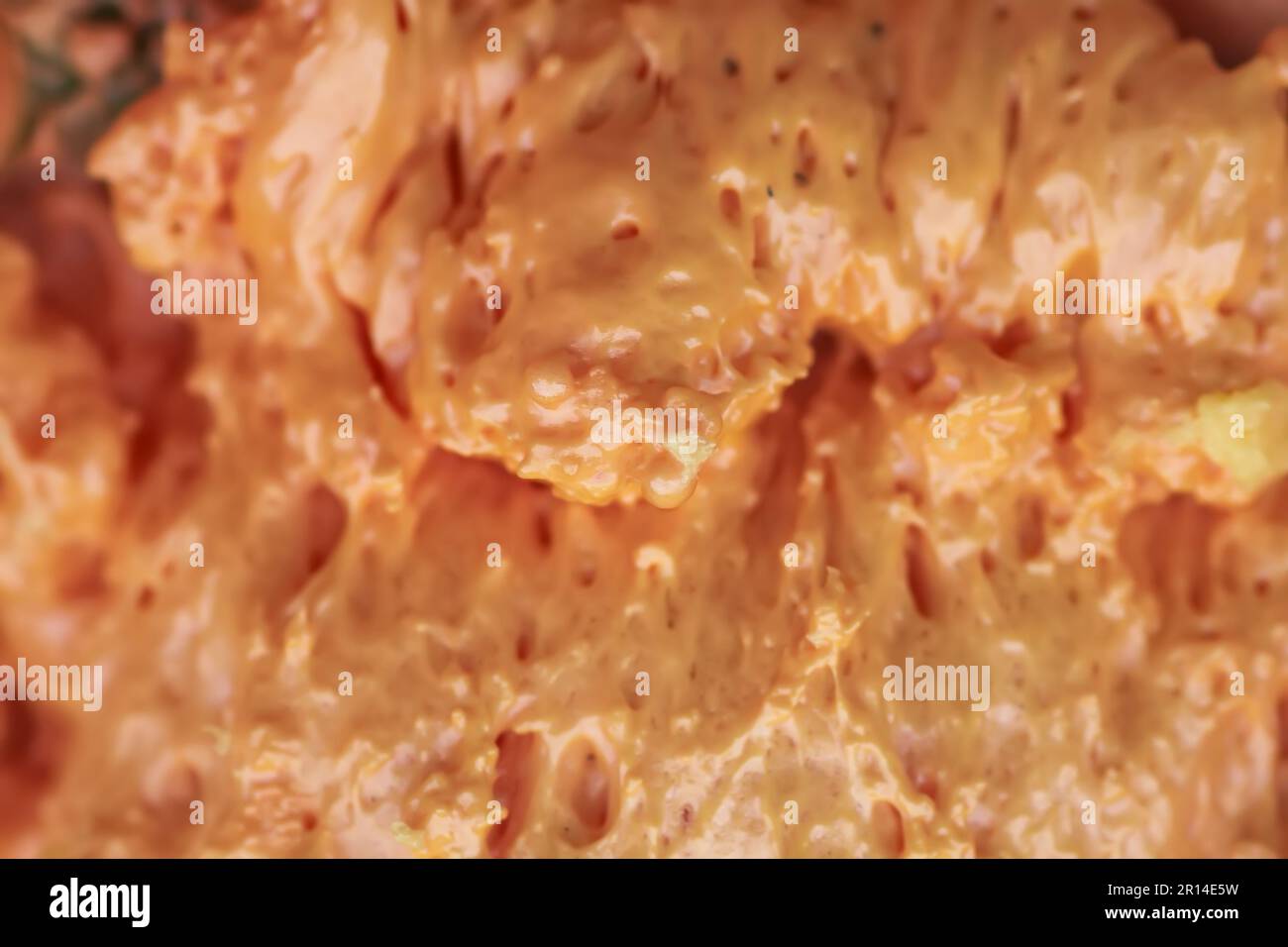 Spraying foam texture. Polyurethane foam close up Stock Photo - Alamy