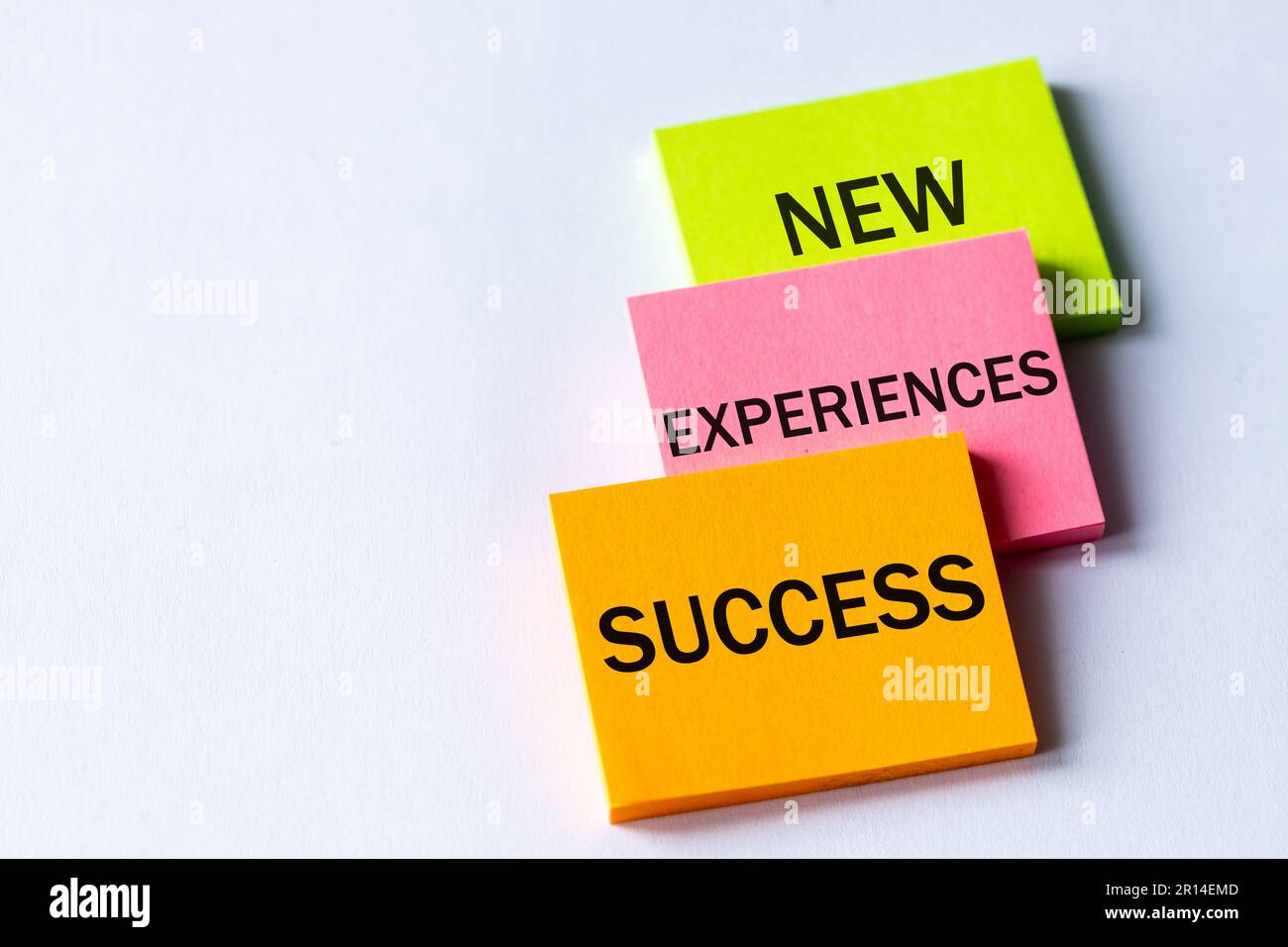 Notes on colorful cards, motivating text, new experiences, positive ...