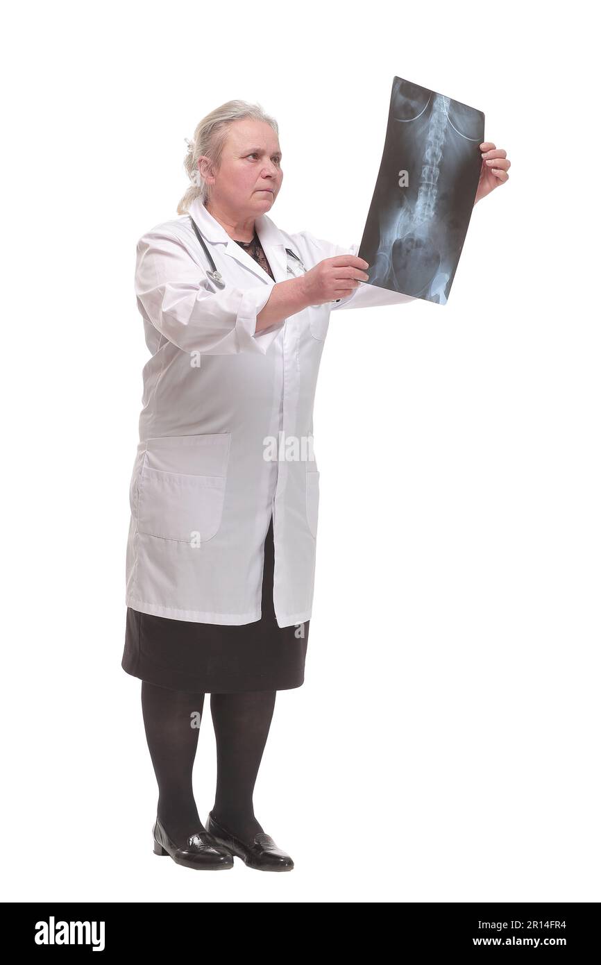Medical doctor analysing x-ray image looking at camera and smiling ...