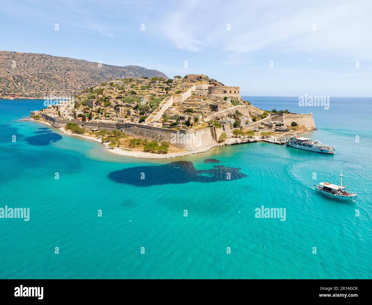 Top view of Spinalonga island with calm sea. Here were lepers humans ...