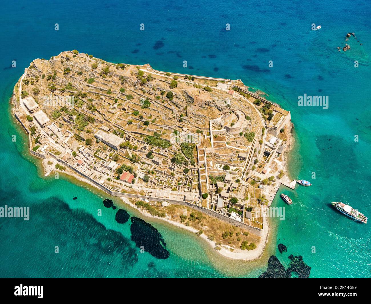 Aerial drone view of Spinalonga island with calm sea. Old venetian ...