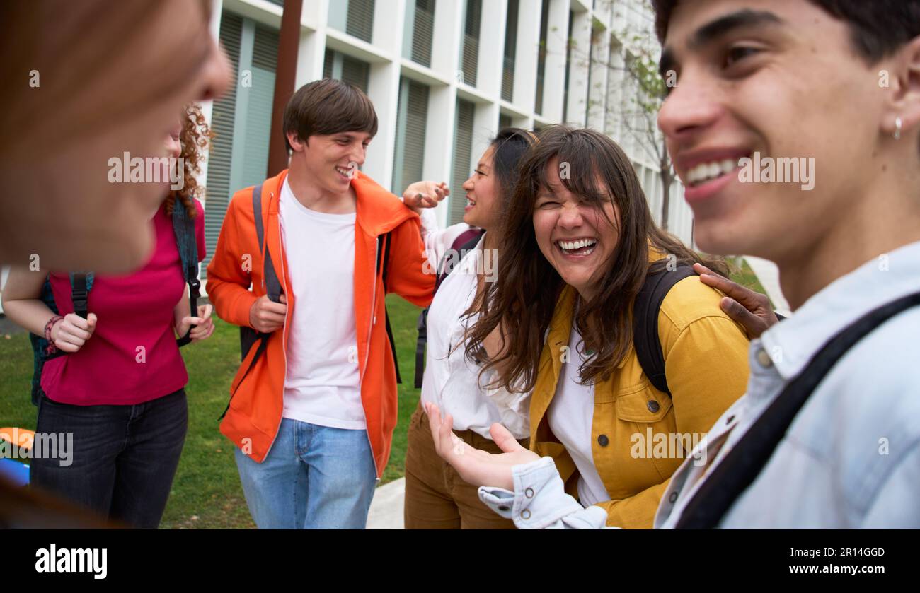 Multiethnic classmates meeting college campus hi-res stock photography ...