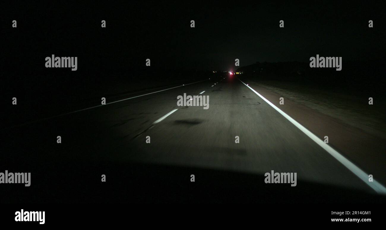 Driving on desert highway night hi-res stock photography and images - Alamy