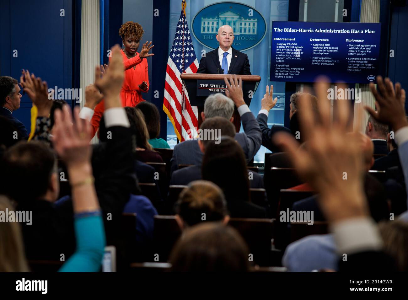 Washington, United States. 11th May, 2023. Reporters raise their hands ...