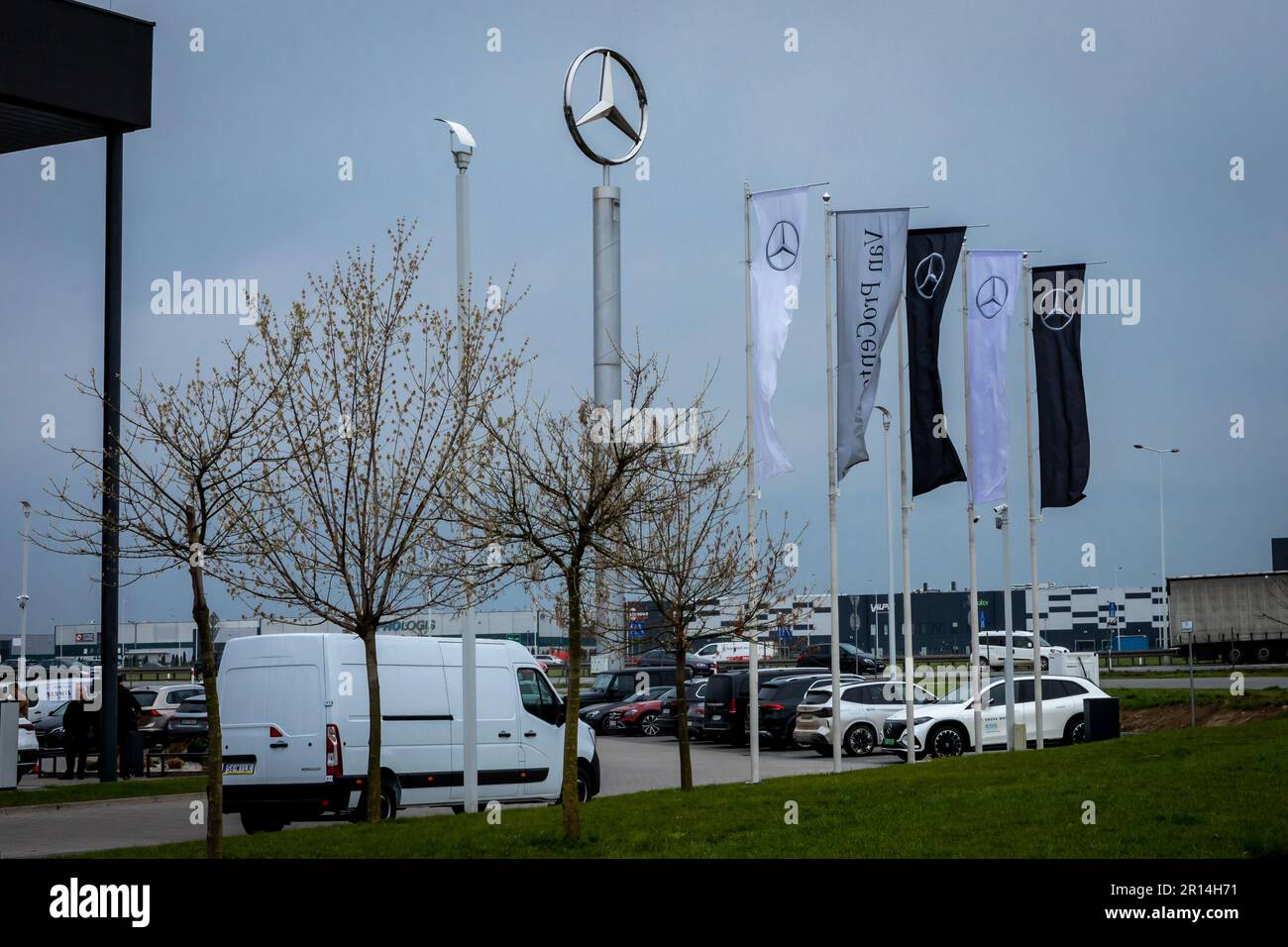 Wroclaw, Poland - April 4, 2023: Banner flags and Mercedes logo in ...