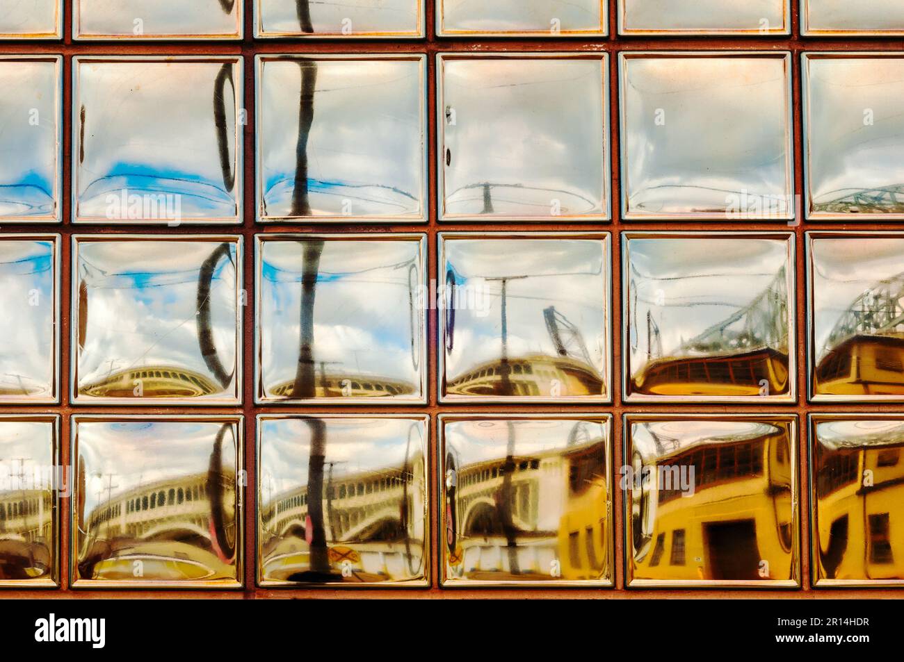 A glass-block window provides a painterly view of Cleveland's Flats ...