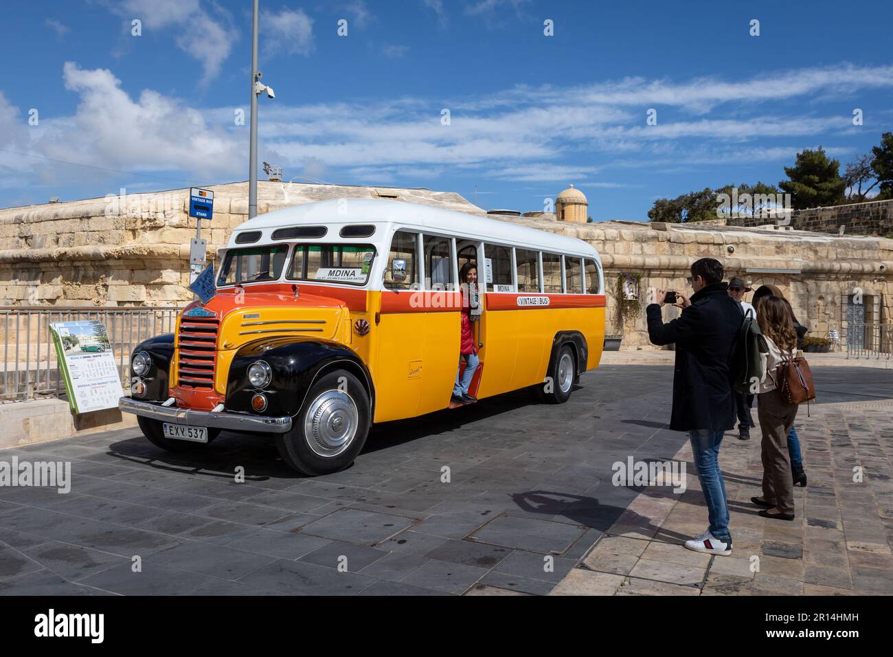 Valletta, Malta - April 18, 2023: Tourists taking photos of a vintage ...