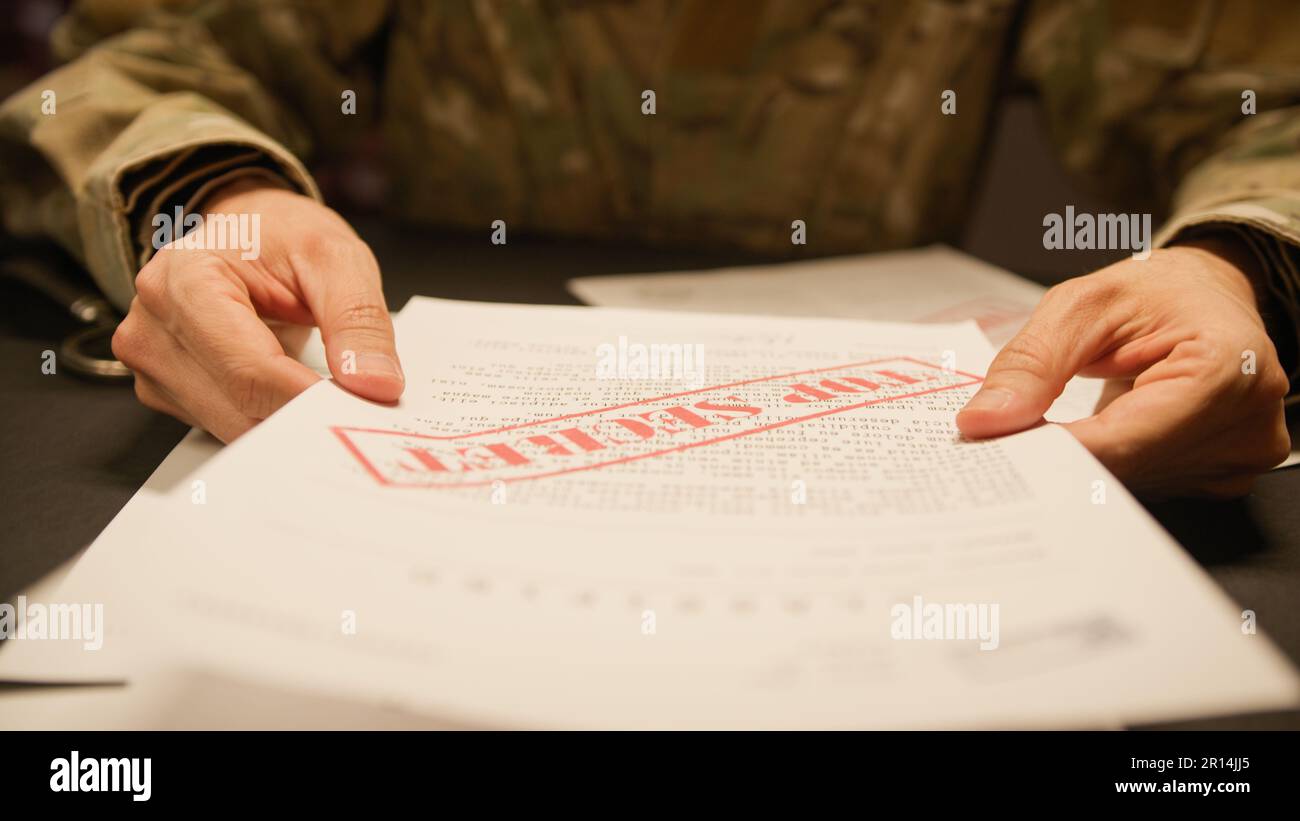 Soldier is Reading Classified Document Stock Photo - Alamy