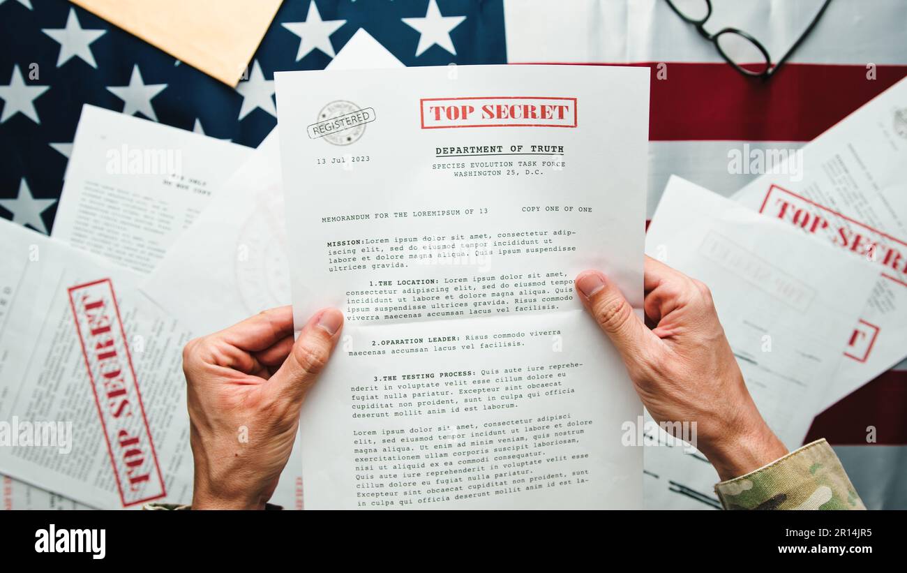 Reading top secret document. Pov View Stock Photo - Alamy