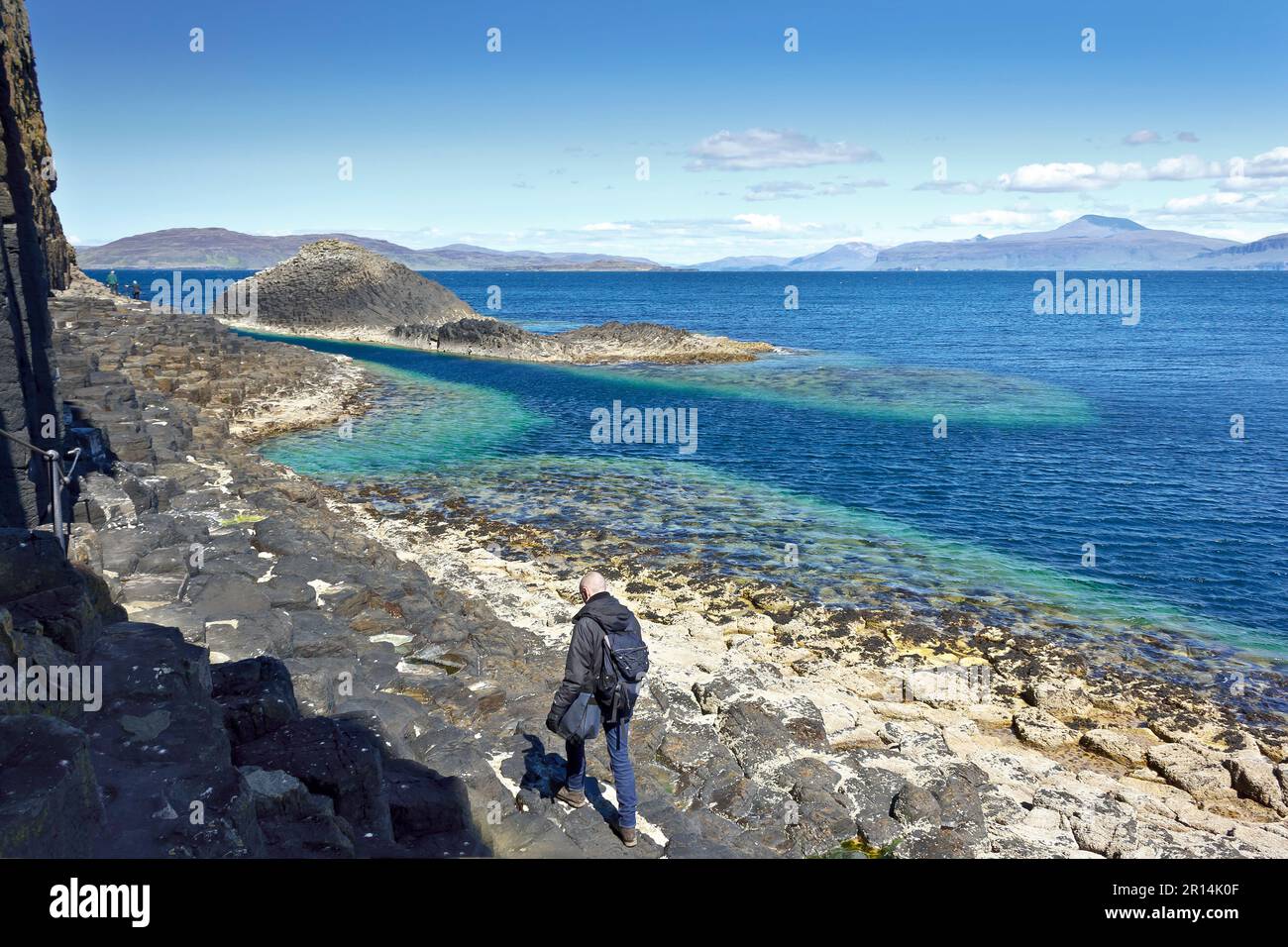 Staffa island, Inner Hebrides, Scotland - June 14, 2015: tourists ...