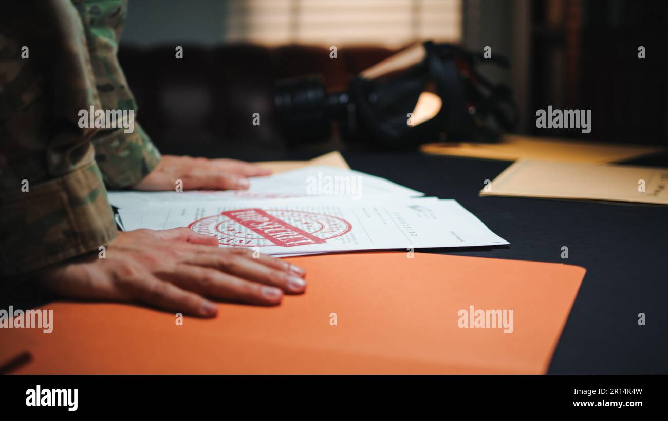 Leafing Through Top Secret Documents Stock Photo - Alamy