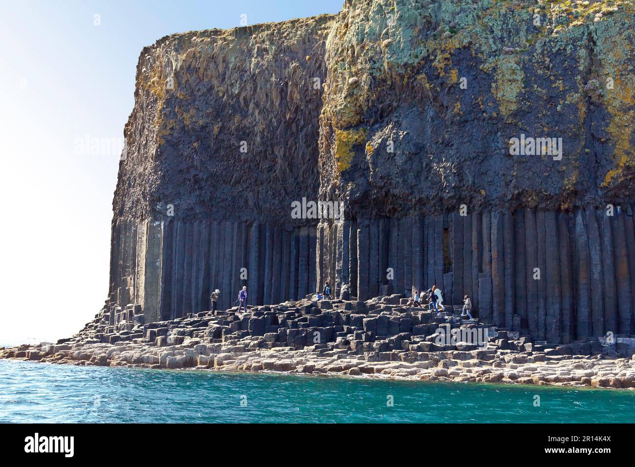 Staffa island, Inner Hebrides, Scotland - June 14, 2015: Tourists ...