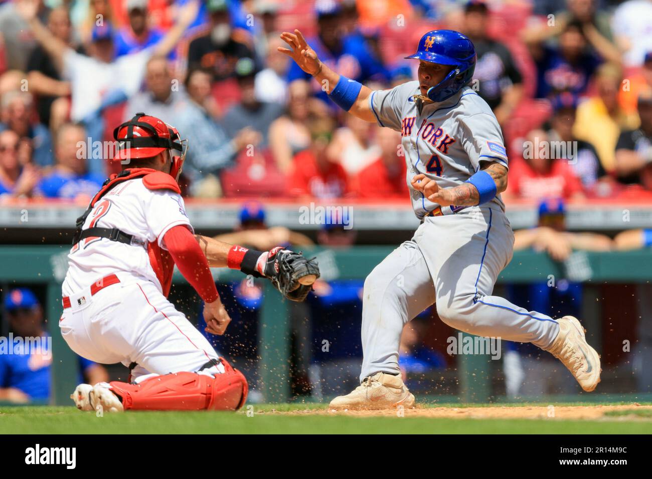 New York Mets' Francisco Alvarez, right, is tagged out at home plate by ...
