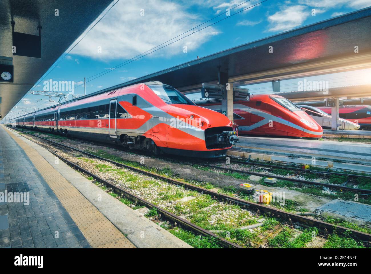 Modern intercity passenger trains on the railway station Stock Photo ...