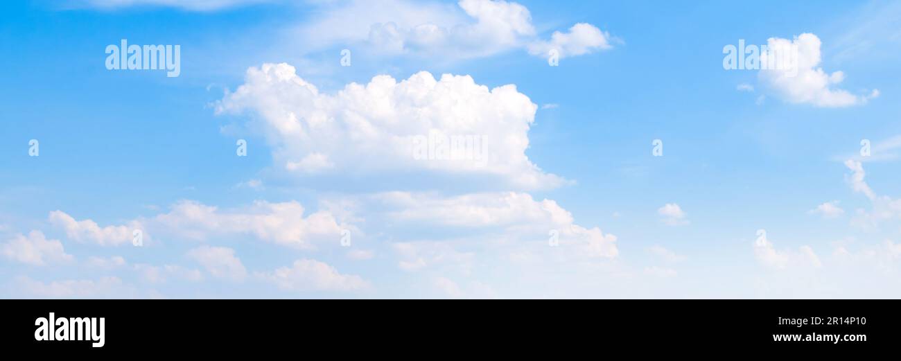 Blue sky with light clouds. Wide photo Stock Photo - Alamy