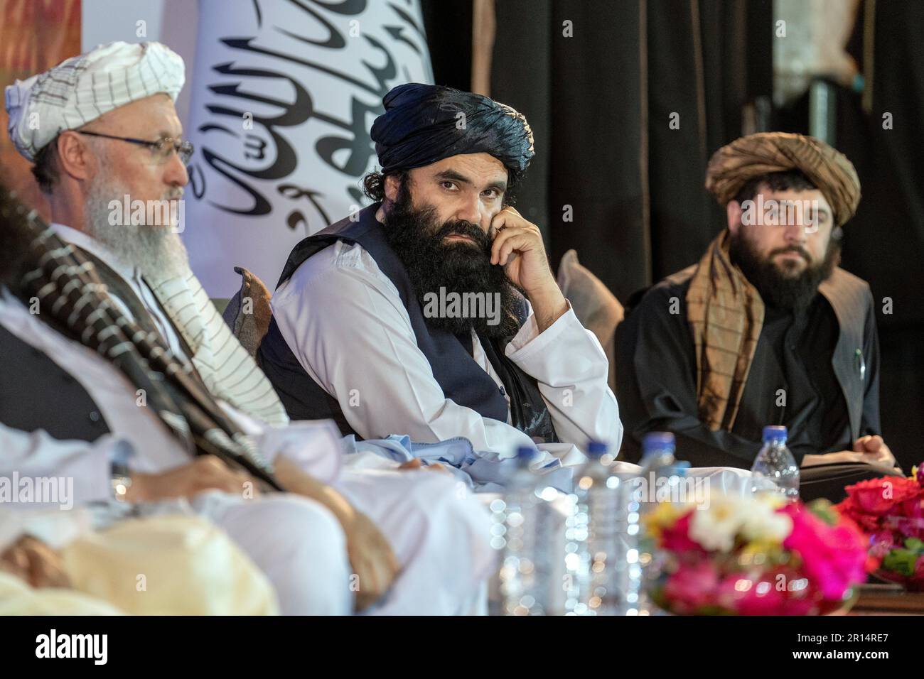 Afghan Taliban's Acting Minister of Interior Sirajuddin Haqqani, center ...