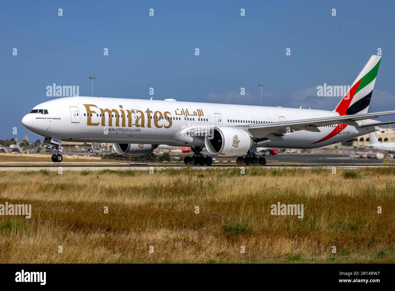 Emirates Boeing 777-31H-ER (REG: A6-ENN) taking off as flight EK110 ...
