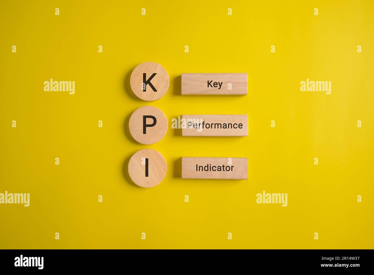 Key Performance Indicator Businessman Holding Wooden Cube With Kpi