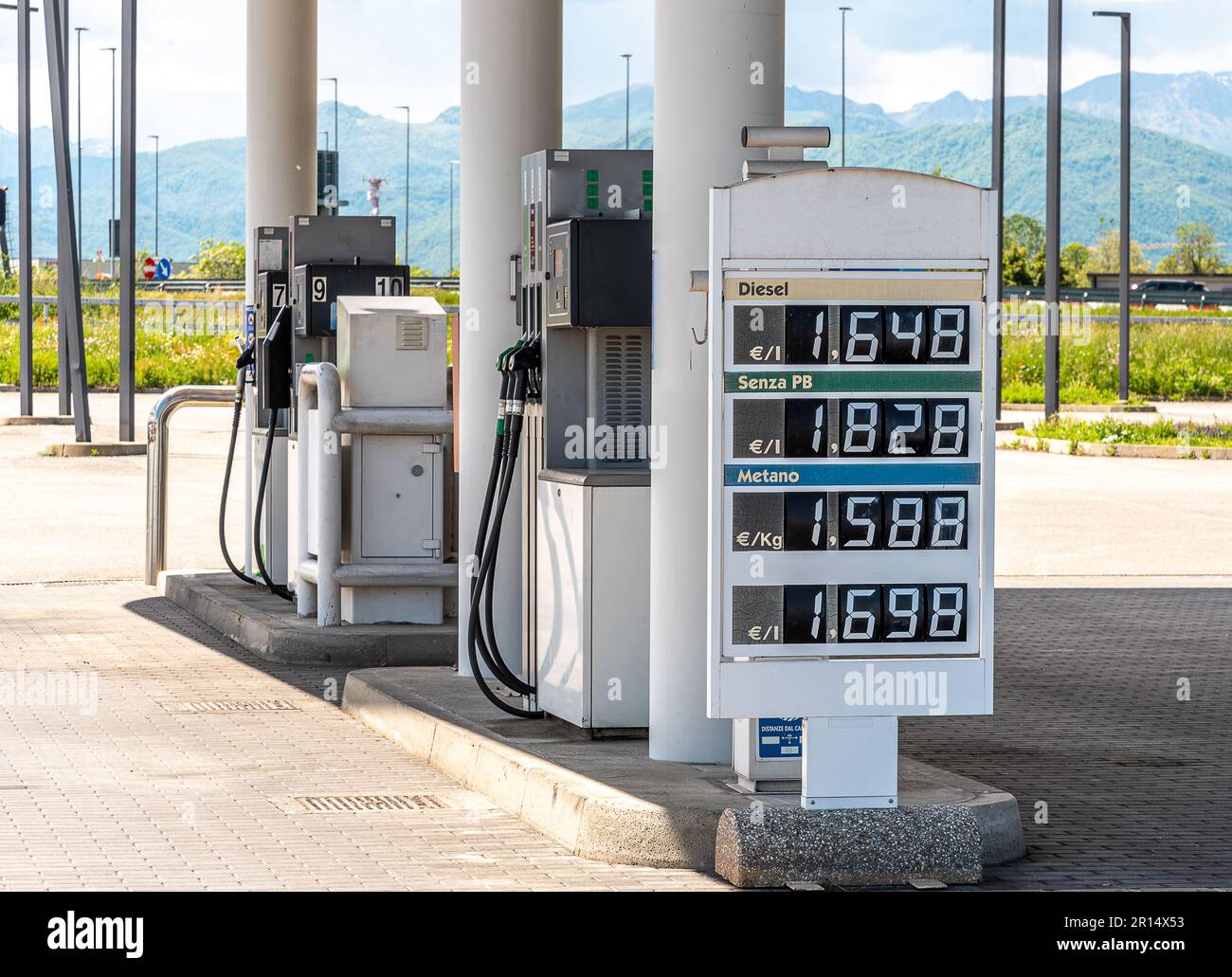 Display with fuel prices at fuel pump with filling nozzles in Italian ... Display with fuel prices at fuel pump with filling nozzles in Italian ...