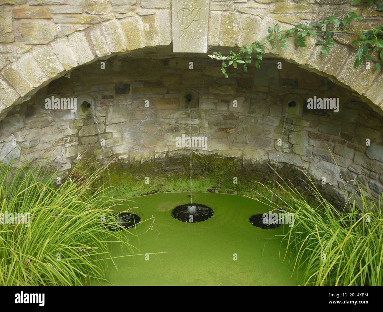 A grotto style water feature by garden designer Peter Antonius at ...