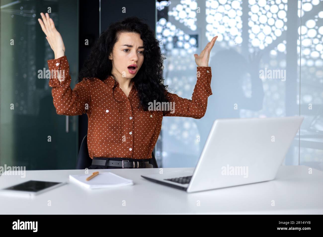 Annoyed and angry businesswoman inside office at workplace, hispanic ...