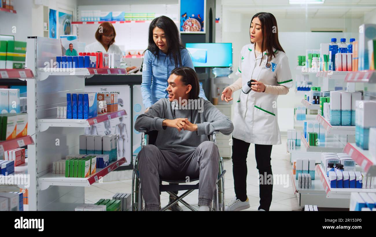 Client with disability and social worker receiving medical supplies in ...
