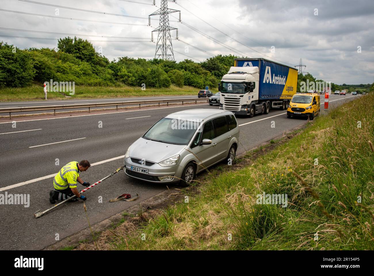 Car being recovered by an AA patrol on the M40 in Oxfordshire, UK Stock ...