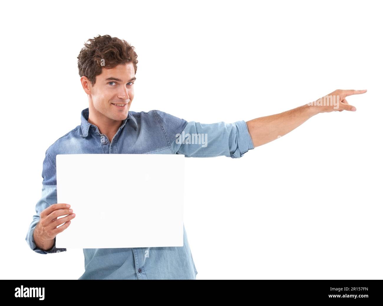 Young man showing a placard Stock Photo - Alamy