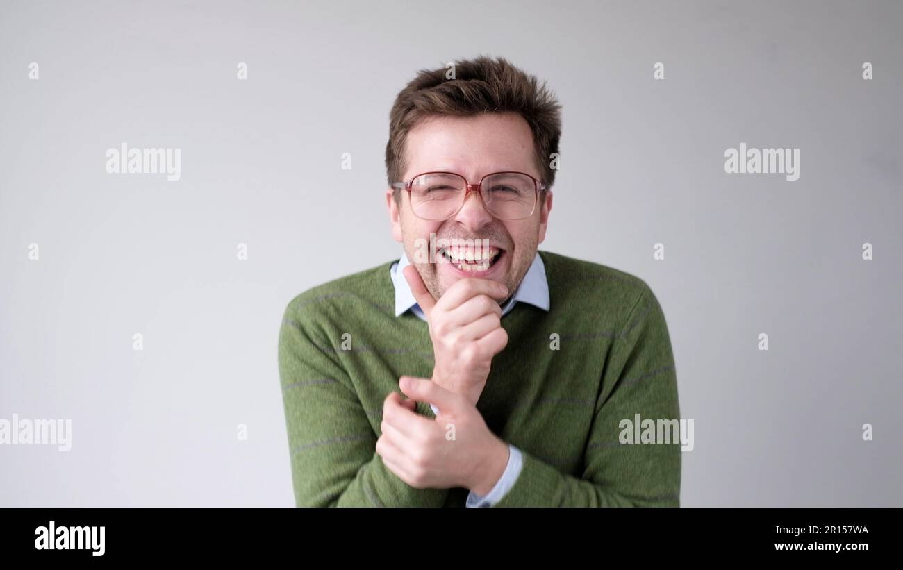 European funny young man is laughing loudly. Positive emotion Stock ...