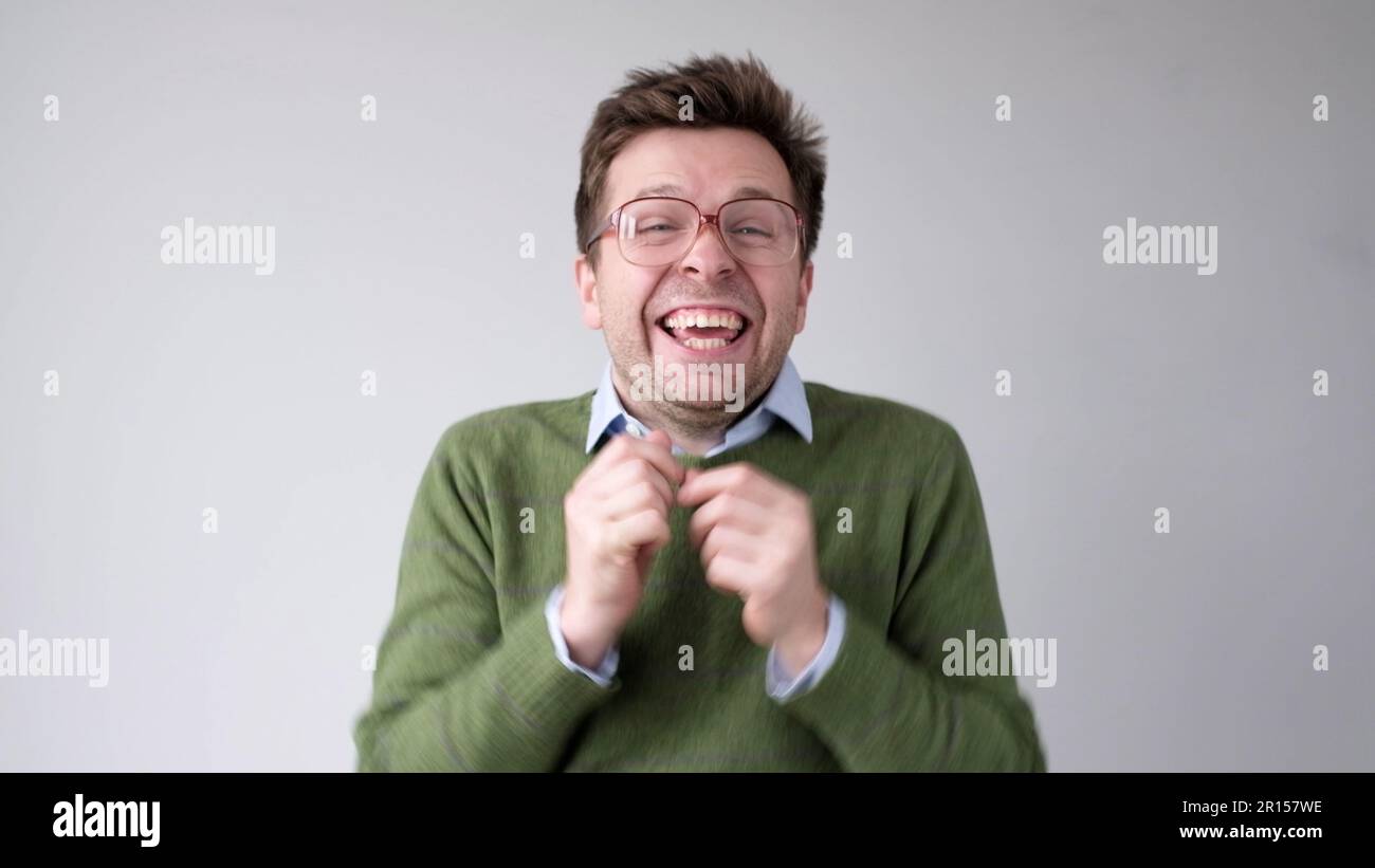 European funny young man is laughing loudly. Positive emotion Stock ...