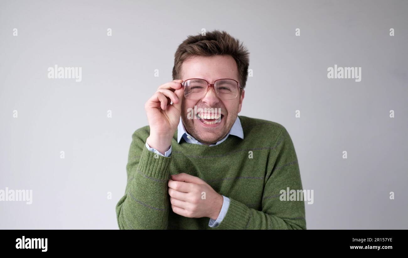 European funny young man is laughing loudly. Positive emotion Stock ...