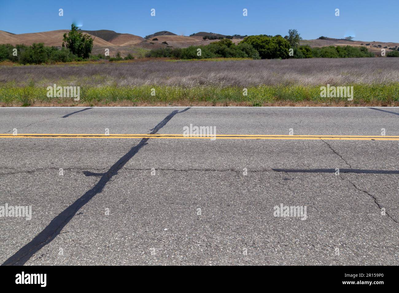riding by car at small roads through California in desert area Stock ...