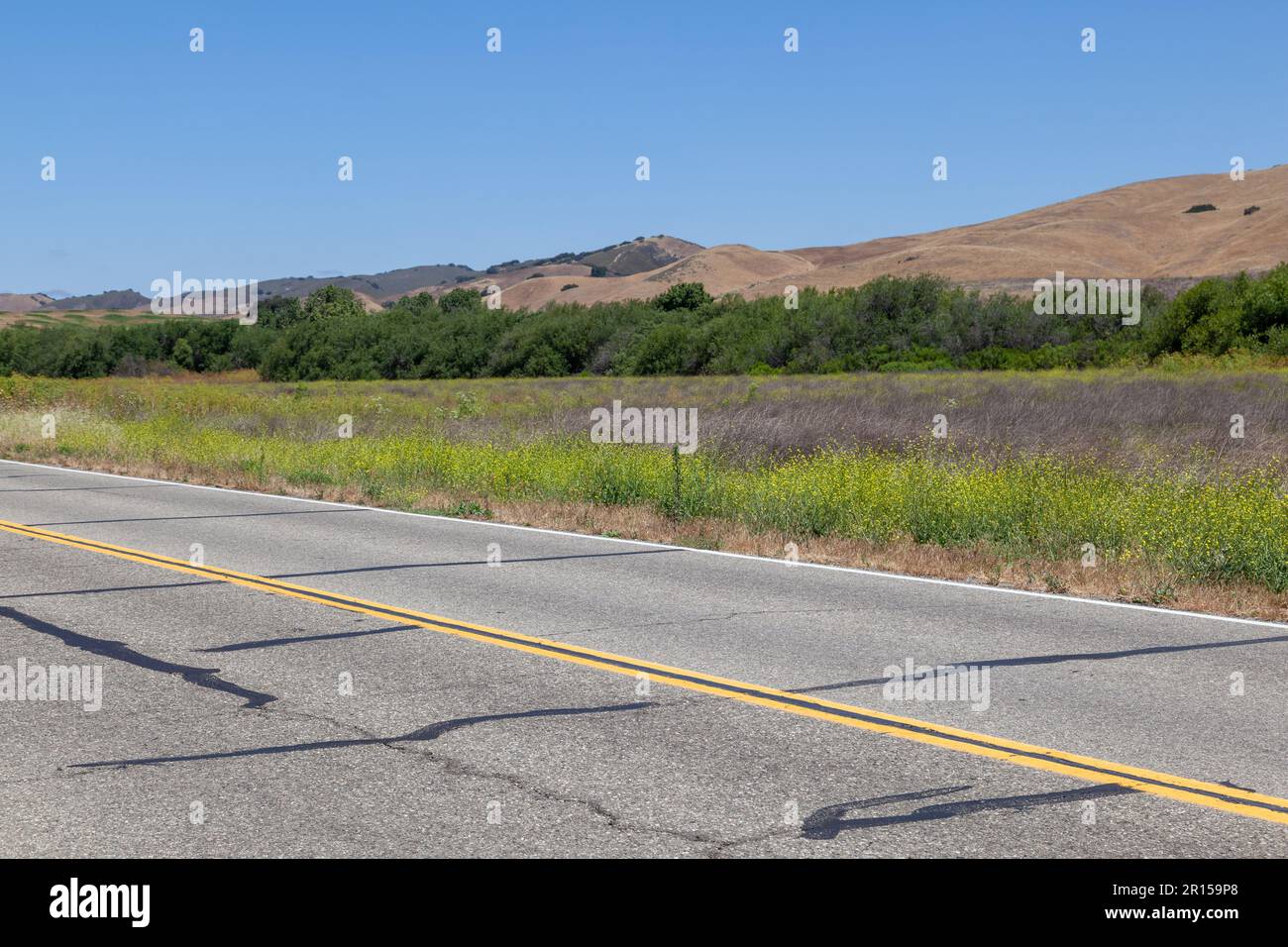 riding by car at small roads through California in desert area Stock ...