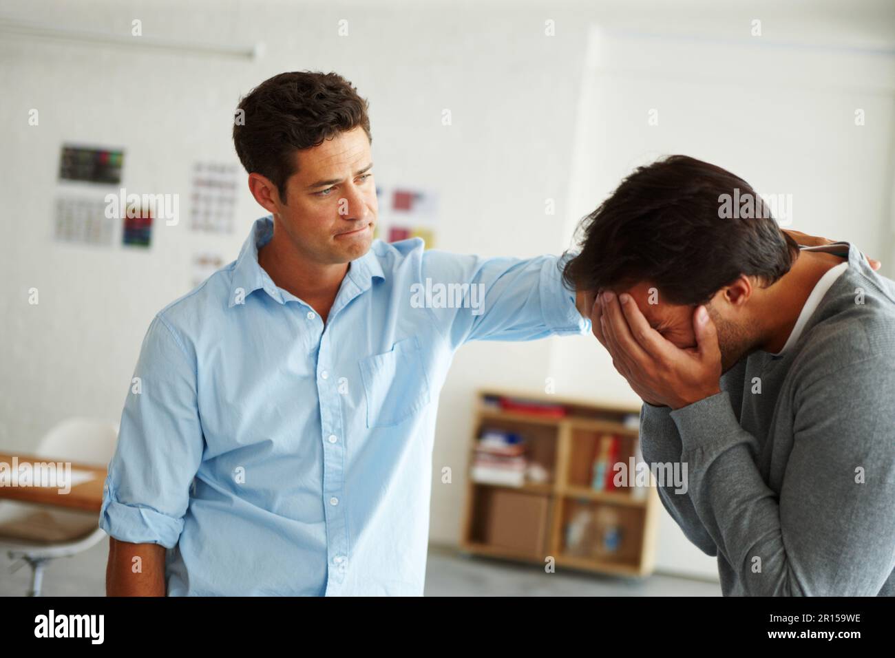 Being there when hes needed. A young man consoling his devastated ...
