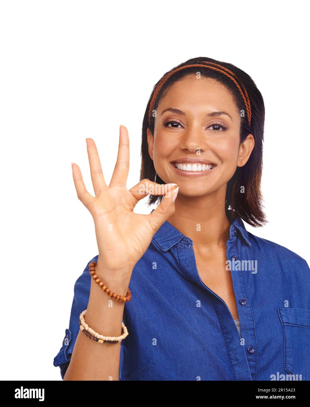 Perfect. An attractive young woman giving you the a-okay sign while ...