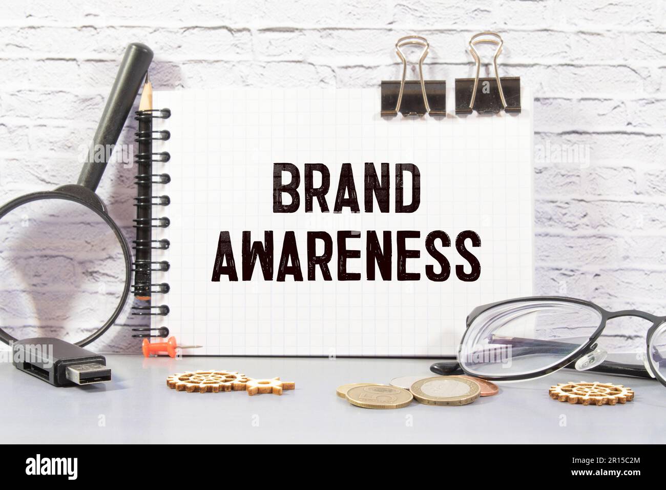 Brand awareness written on paper clipboard isolated on white background ...