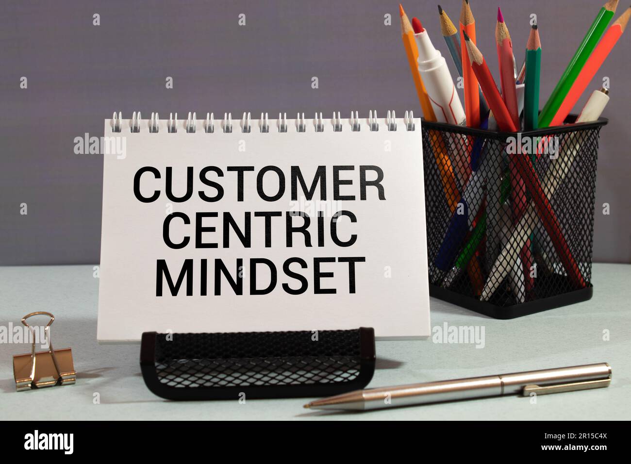 Customer Centric Mindset write on a book isolated on Office Desk Stock ...
