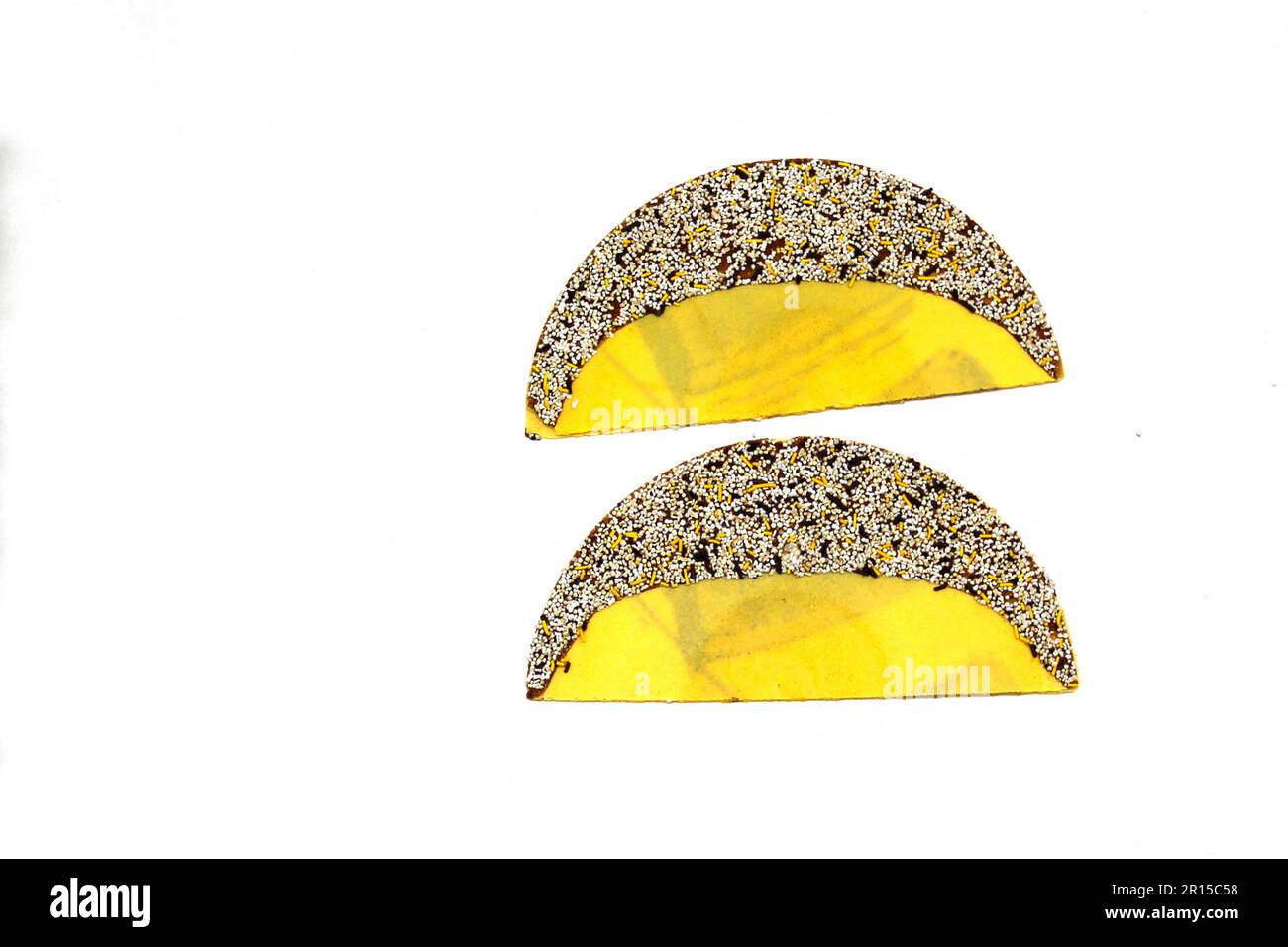 Typical Mexican sweet Pepitorias yellow wafers with chocolate and ...