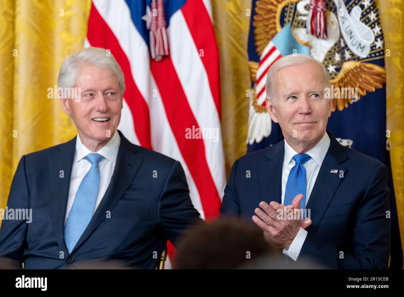 President Joe Biden and former President Bill Clinton attend an event ...
