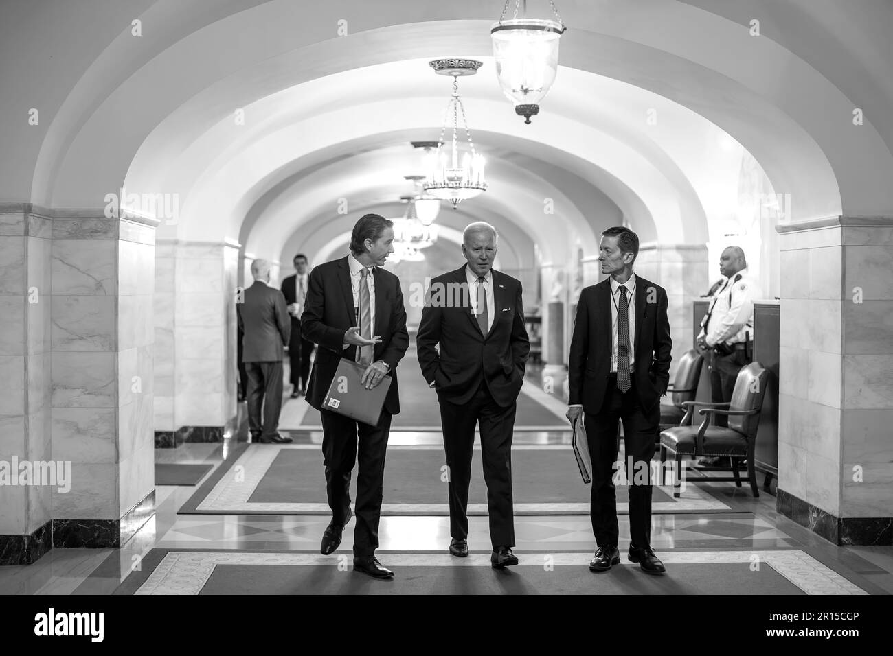 President Joe Biden walks with Senior Adviser for Energy Security Amos ...