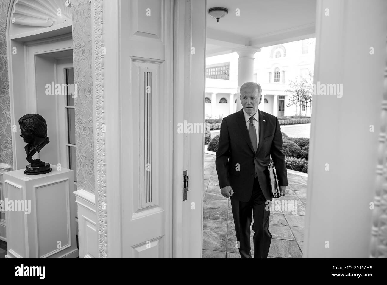 President Joe Biden arrives to the Oval Office, Friday, February 17 ...