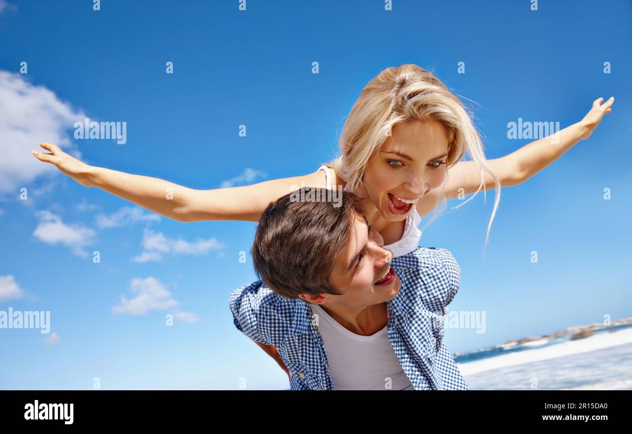 Add some silly to your summer. a happy young couple enjoying a ...