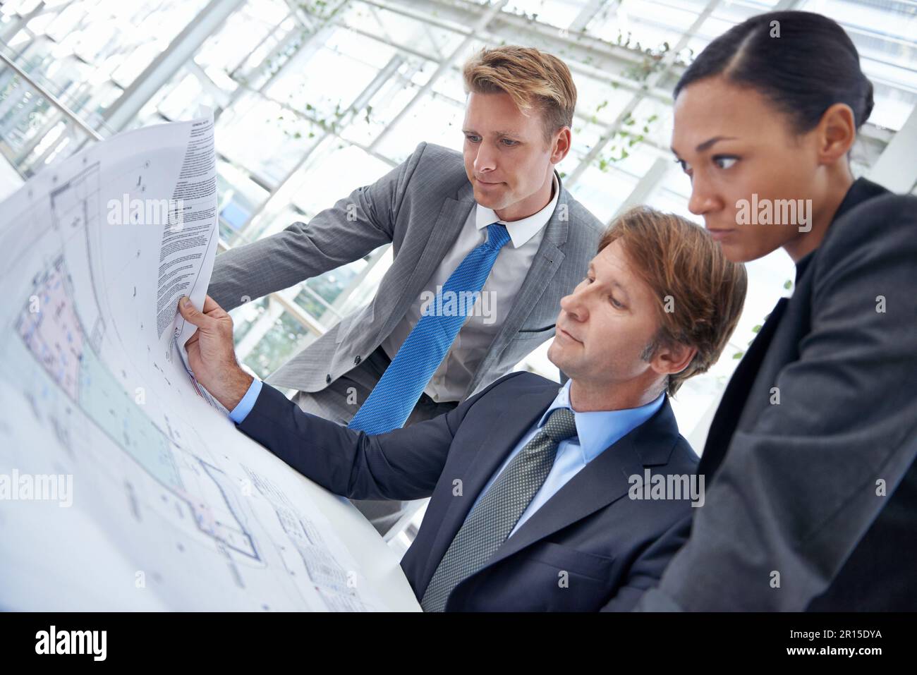 Its all about the little details...A group of architects looking over ...