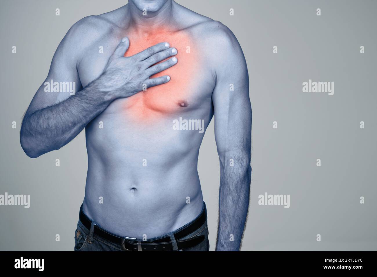 Feeling the aches and pains. Studio shot of a mature man rubbing the ...