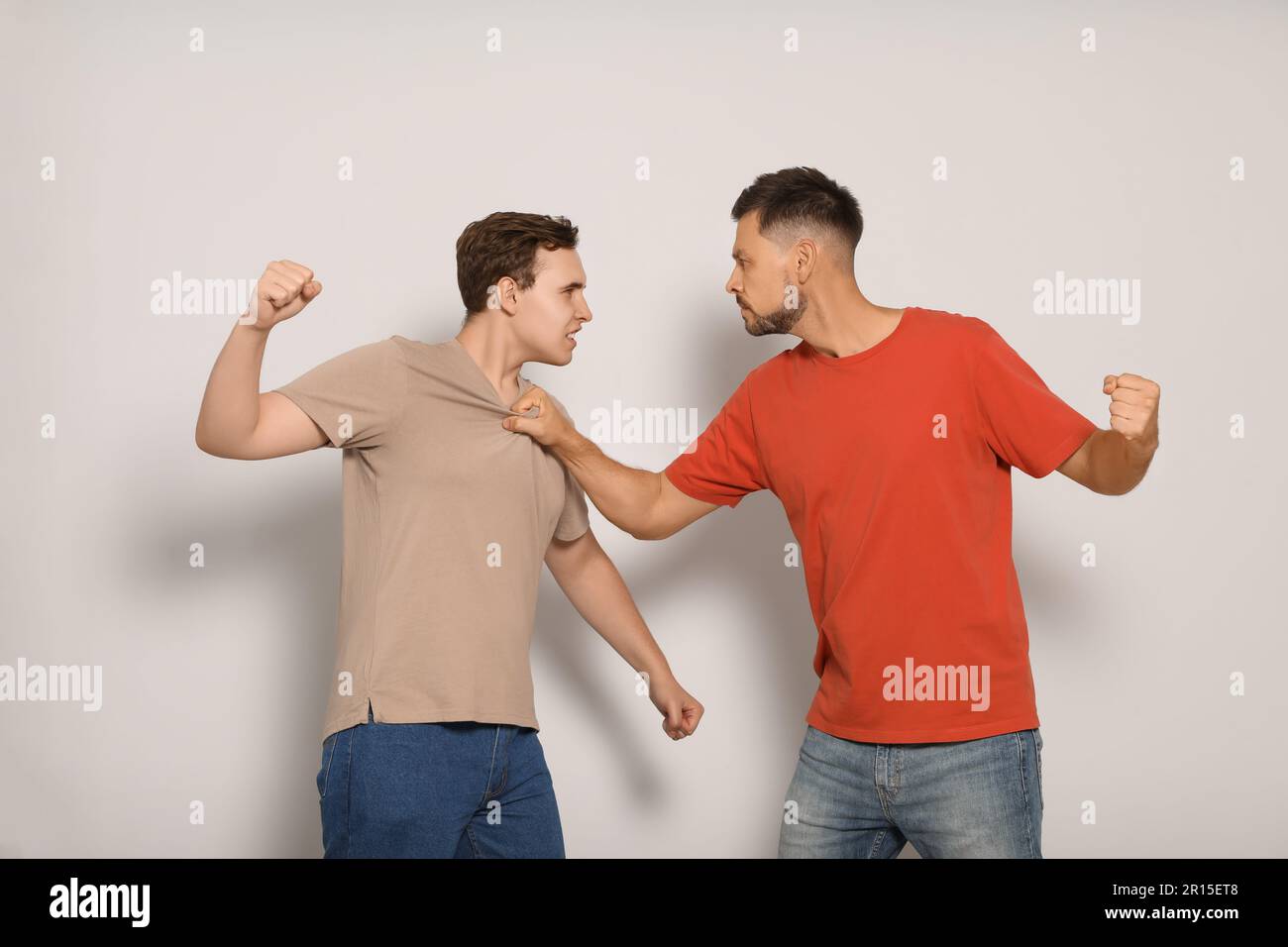 Mature men fighting hi-res stock photography and images - Alamy