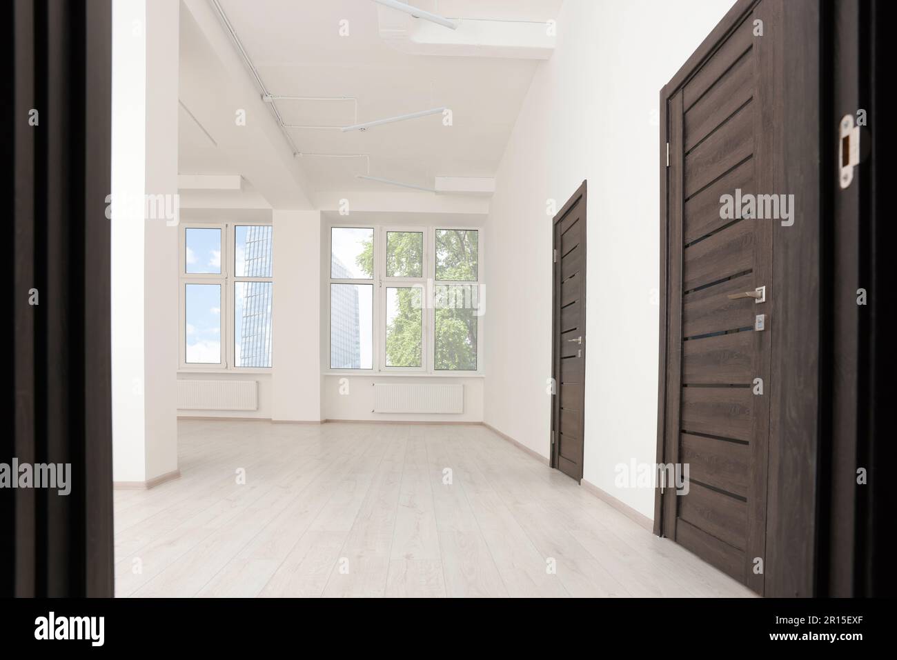 Modern office room with windows and doors. Interior design Stock Photo ...