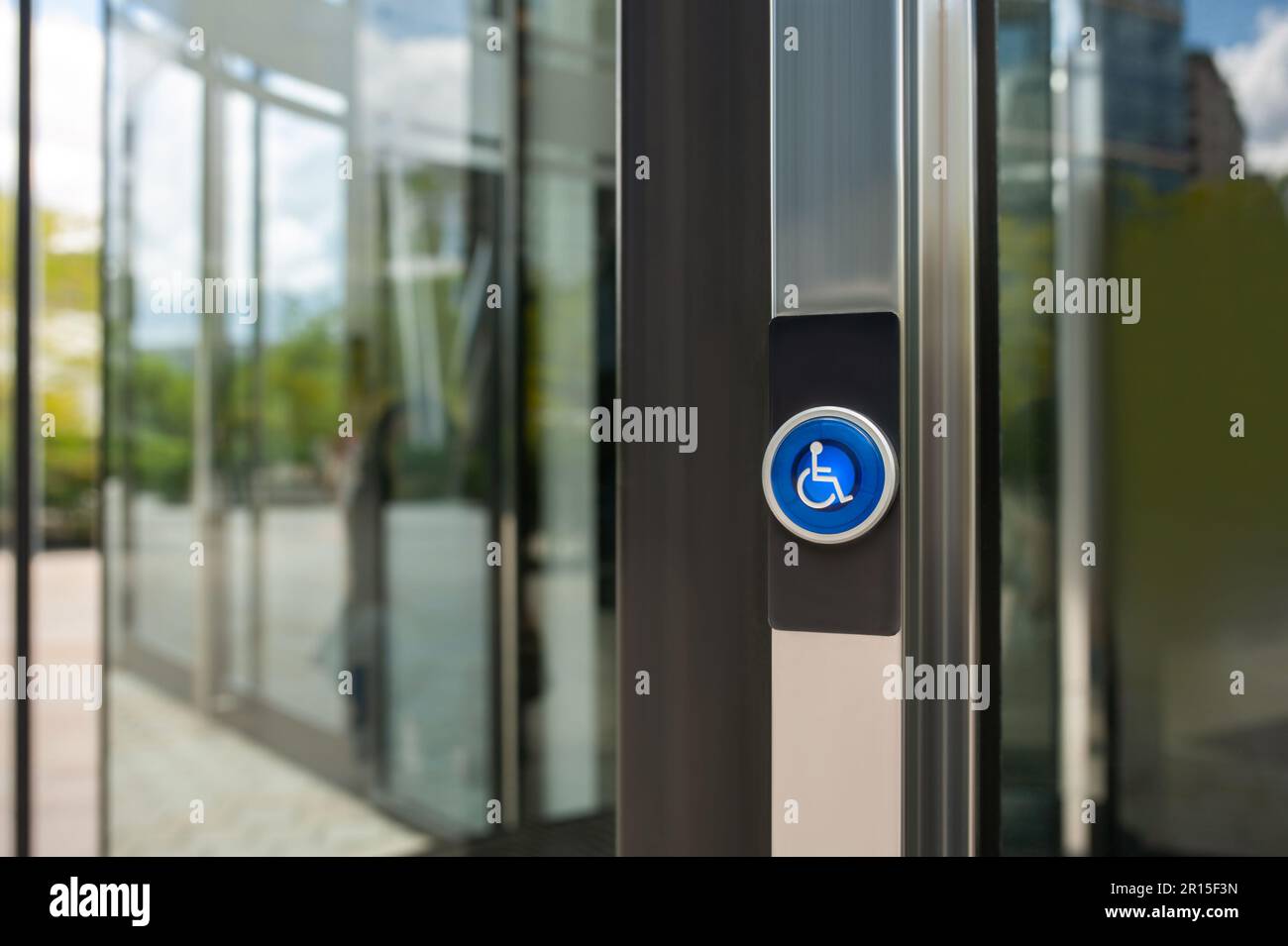 Blue bell button for people with disability Stock Photo - Alamy