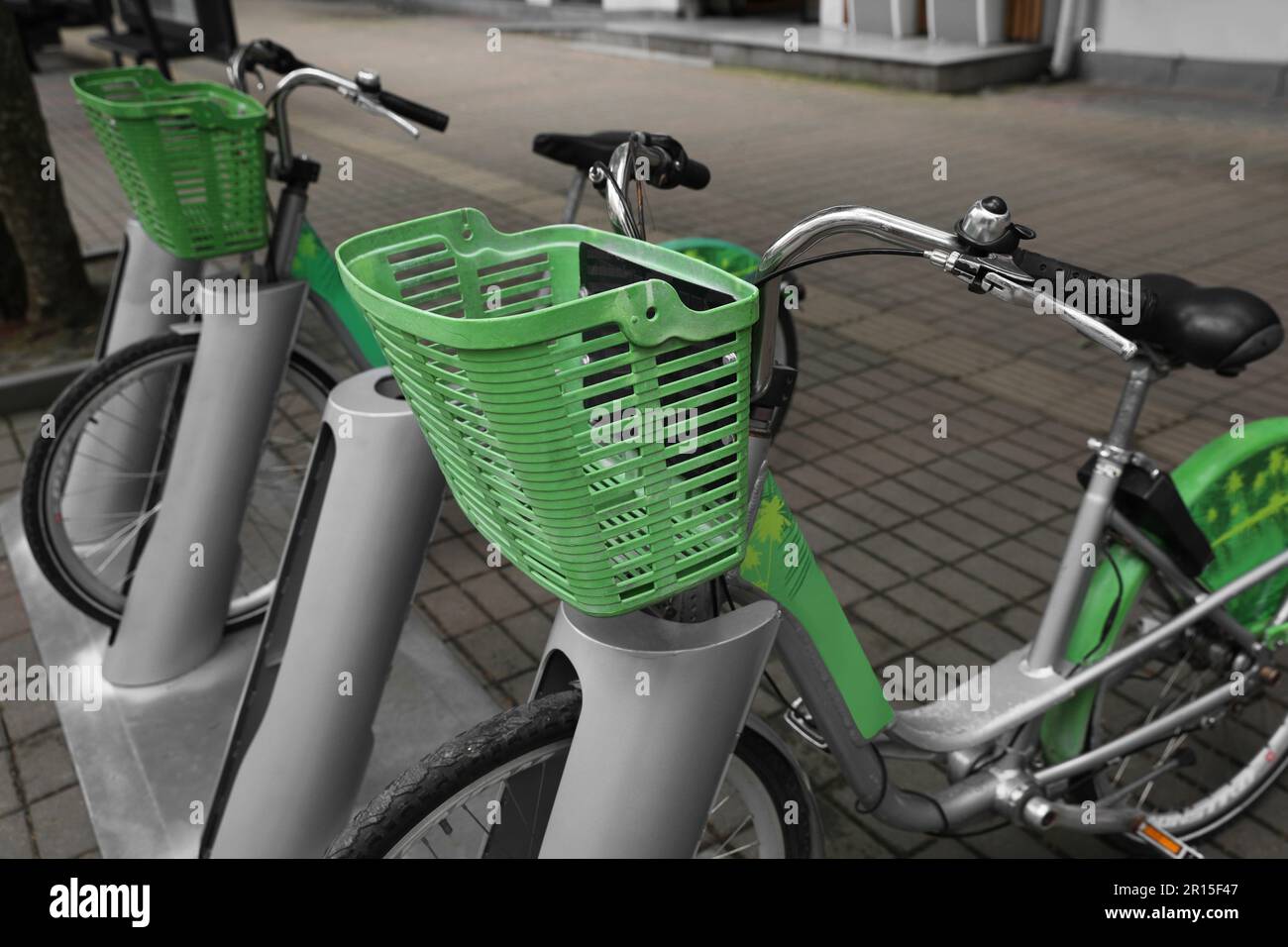 Parking rack with bicycles on city street Stock Photo - Alamy
